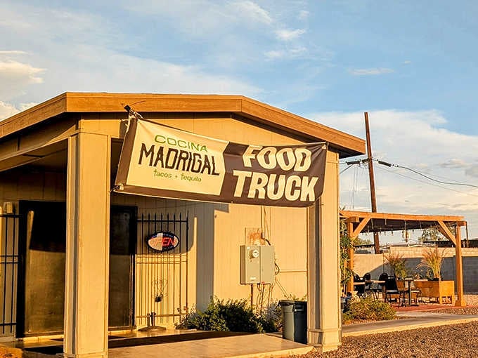 That golden Arizona light hits the Cocina Madrigal sign like a spotlight on opening night.