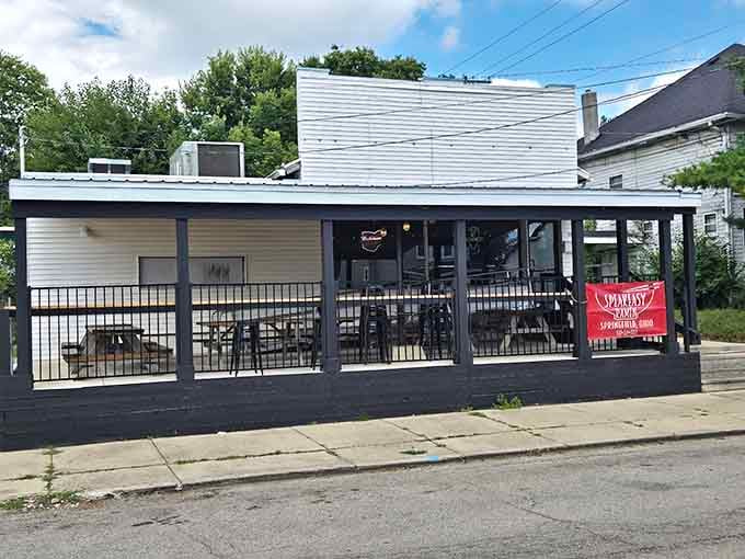 Small building, big dreams, and a covered porch that says "stay a while."