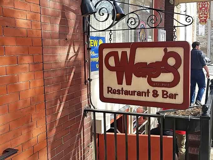 That sign isn't just hanging there looking pretty; it's practically waving you inside for the best burger of your life.