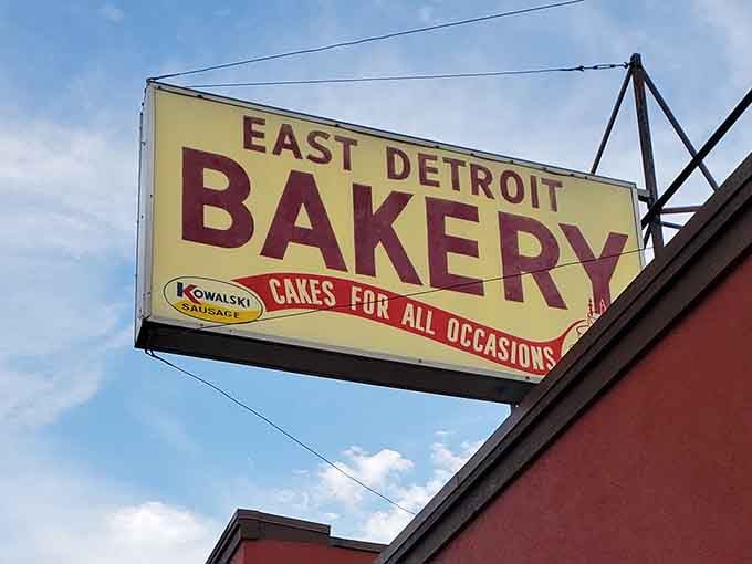Classic neighborhood bakery vibes where the sign promises cakes and the reality delivers so much more than expected.