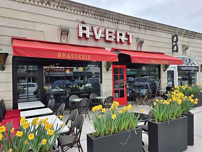 That red awning and those cheerful daffodils announce you've found a little slice of Paris right here.