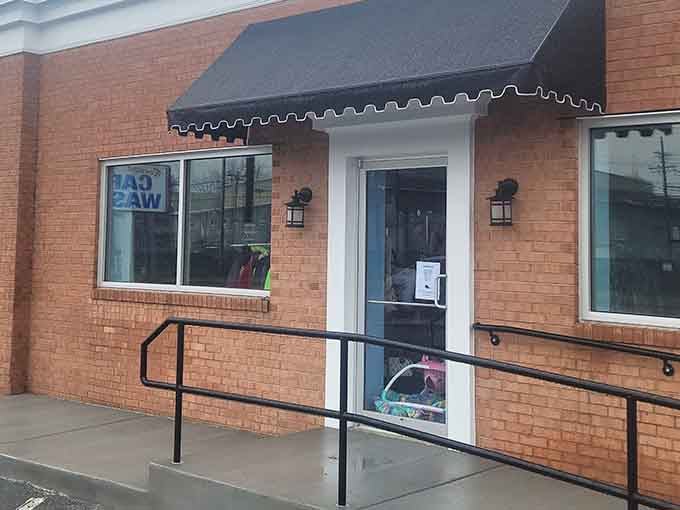The black awning and lantern lights give Fetch a welcoming charm that pulls you right through the door.