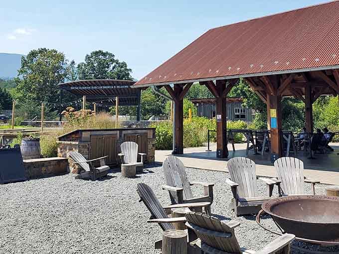 Adirondack chairs, a fire pit, and mountain air. Honestly, your living room couch never stood a chance against this setup.