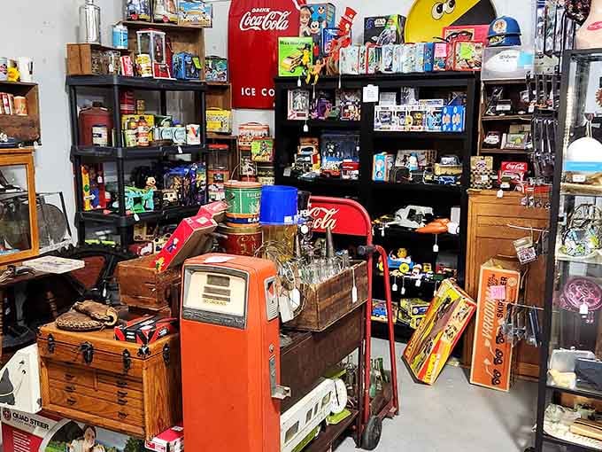 Explore an incredible, crowded room packed full of vintage toys, retro Coca-Cola memorabilia, and unique antique treasures waiting for you.