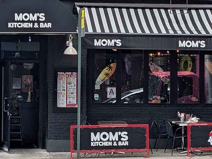 Bold, black, and unapologetic, Mom's Kitchen and Bar announces itself like it means business.