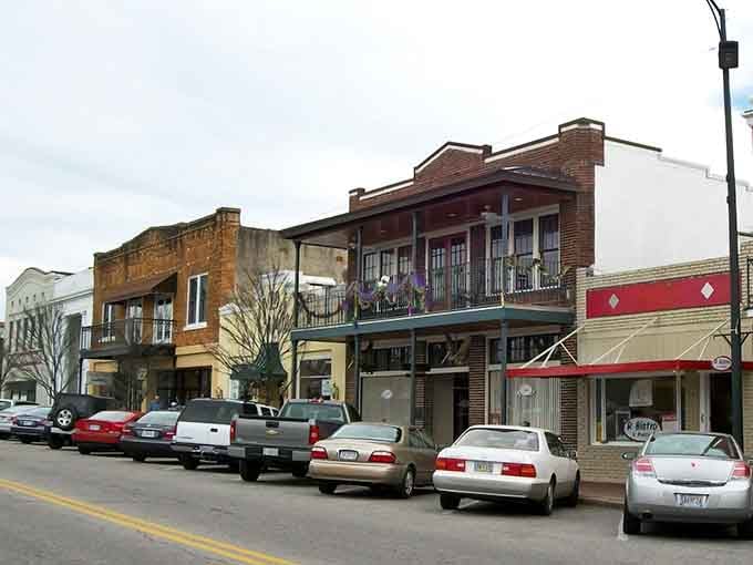 Historic brick storefronts and iron balconies give Fairhope's main street a character no strip mall could ever fake.