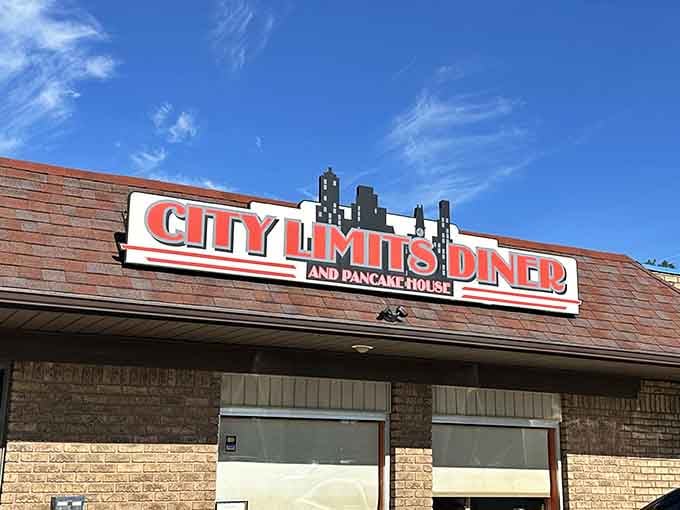 That bold red signage against a perfect blue sky practically shouts "breakfast is served" louder than your alarm clock.