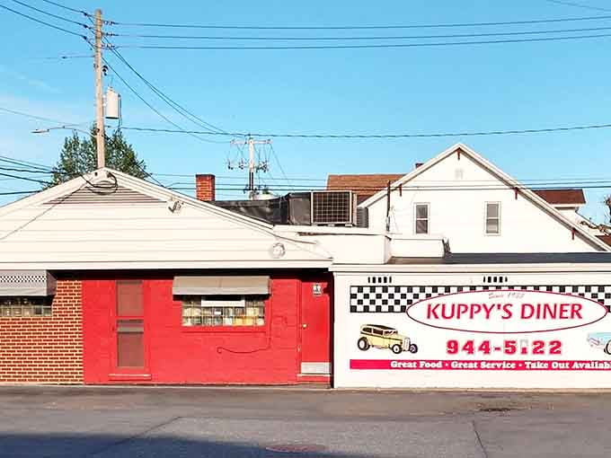 Bold red walls and a checkered border tell you everything you need to know before you even walk in.