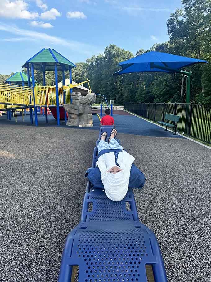 Sometimes the best seat in the house is a long blue bench with nowhere to be and all day to get there.