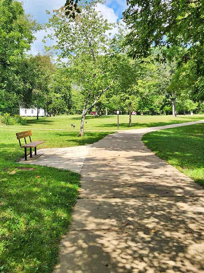 A shaded pathway, a park bench, and zero deadlines. Alley Spring understands what relaxation actually looks like.