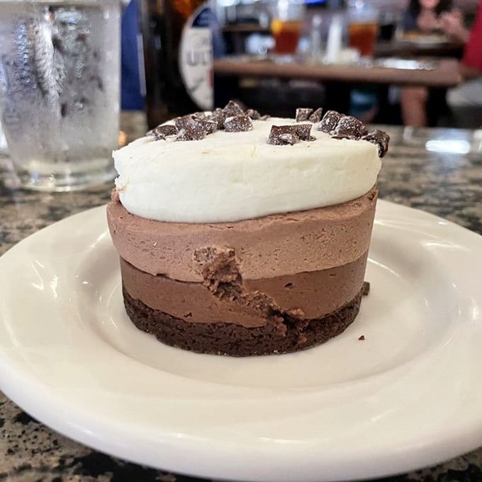 This Chocolate Mousse dessert is layered, cloud-topped, and decorated with chocolate pieces. Dessert doesn't get more dignified than this.