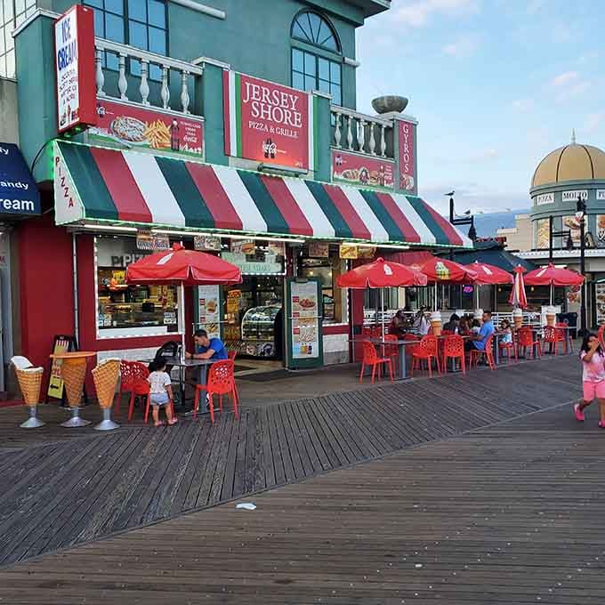 Jersey Shore Pizza and Grille, where red umbrellas and striped awnings signal that a satisfying meal is very close.