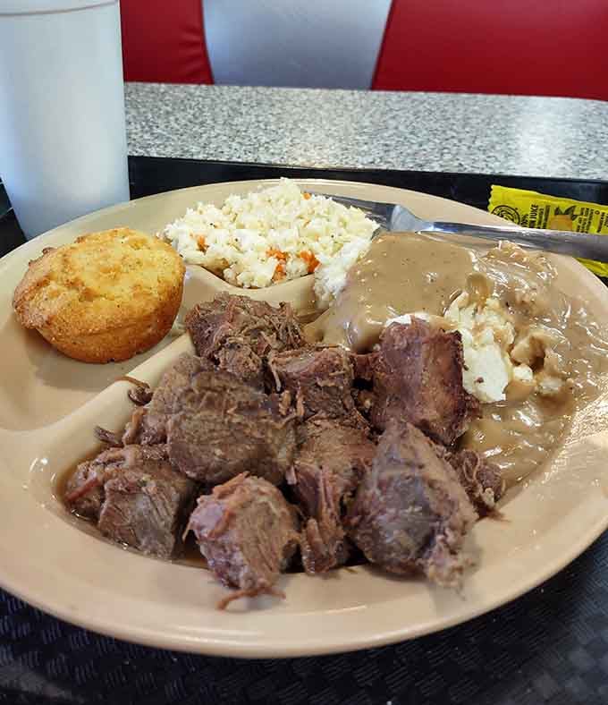 Stew beef with mashed potatoes, slaw, and cornbread &mdash; the kind of plate grandma would proudly approve.
