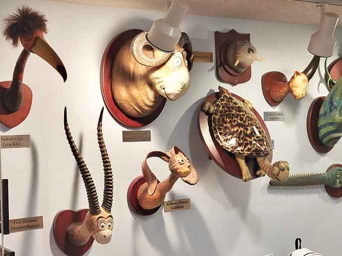 Cartoon trophy heads mounted on the wall, the most cheerful hunting lodge you'll ever walk through.