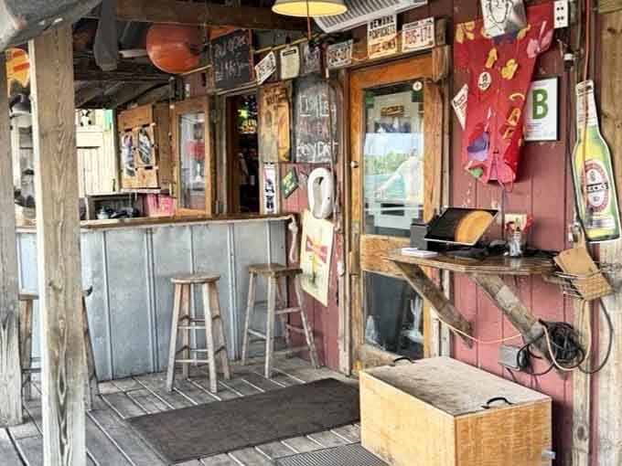 Signs everywhere, a neon glow overhead, and the quiet promise that something delicious waits just beyond the gate.