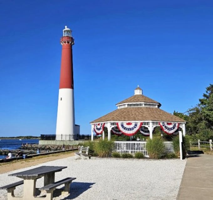 The park's charming gazebo draped in patriotic bunting sits beside Old Barney, making this corner of New Jersey feel genuinely, wonderfully American.