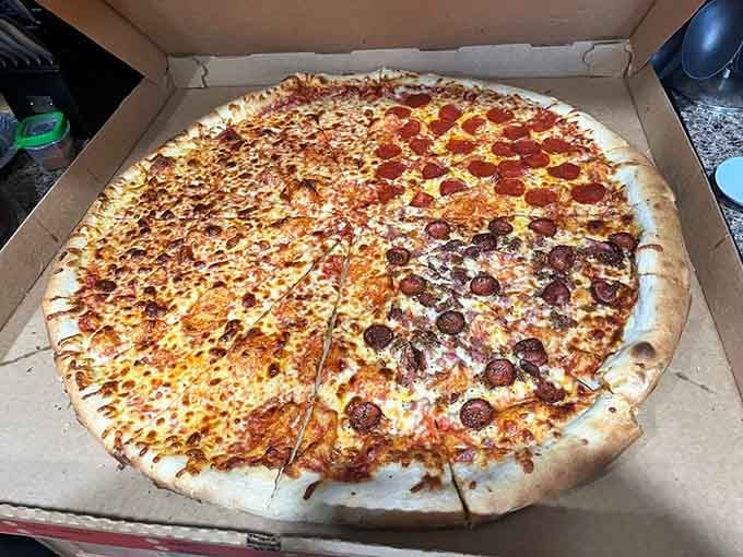 A whole pie divided into quarters that still look like full meals from any other pizzeria.