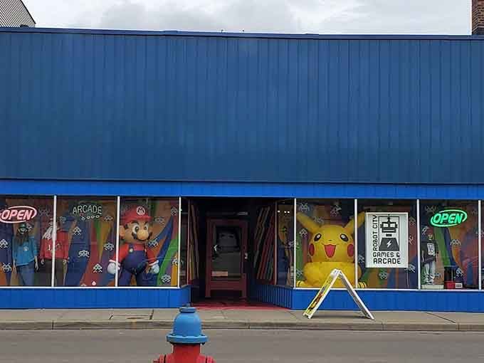 Robot City Games and Arcade is where nostalgia lives, Pikachu guarding the door like a very enthusiastic bouncer.
