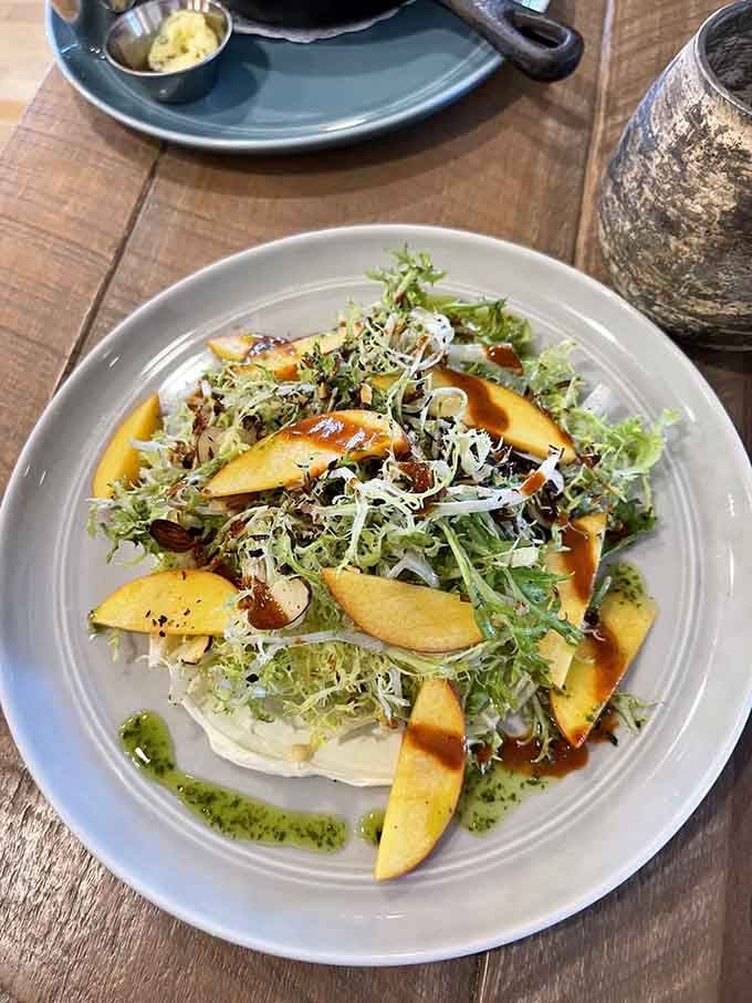 Peach slices, frisée, and a drizzle of something wonderful. This salad makes you rethink everything you thought salads were supposed to be.