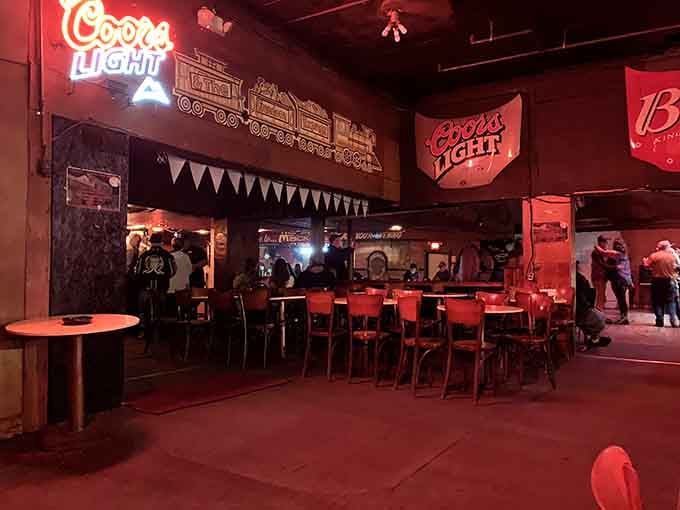 Neon beer signs illuminate another angle of this sprawling space where country music meets the unexplained.