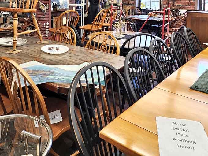 A long farmhouse table surrounded by mismatched Windsor chairs. Every Sunday brunch you never had is waiting right here.