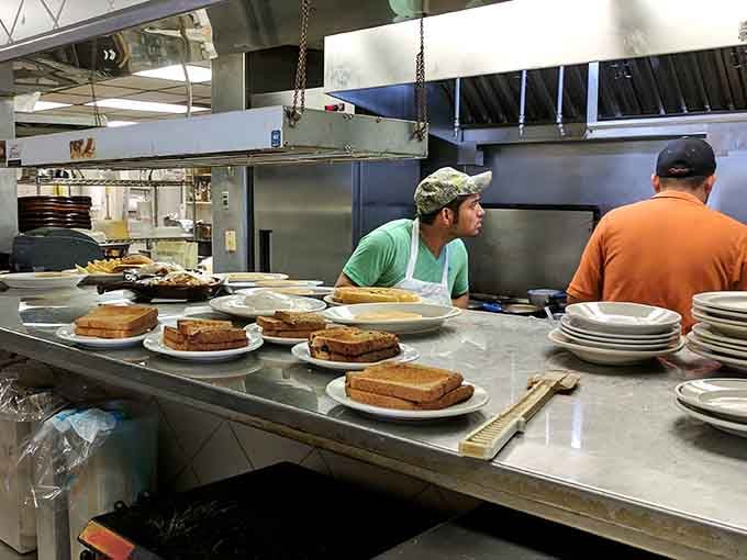 Behind the scenes, stacks of golden French toast await their moment of glory on hungry customers' tables across the dining room.