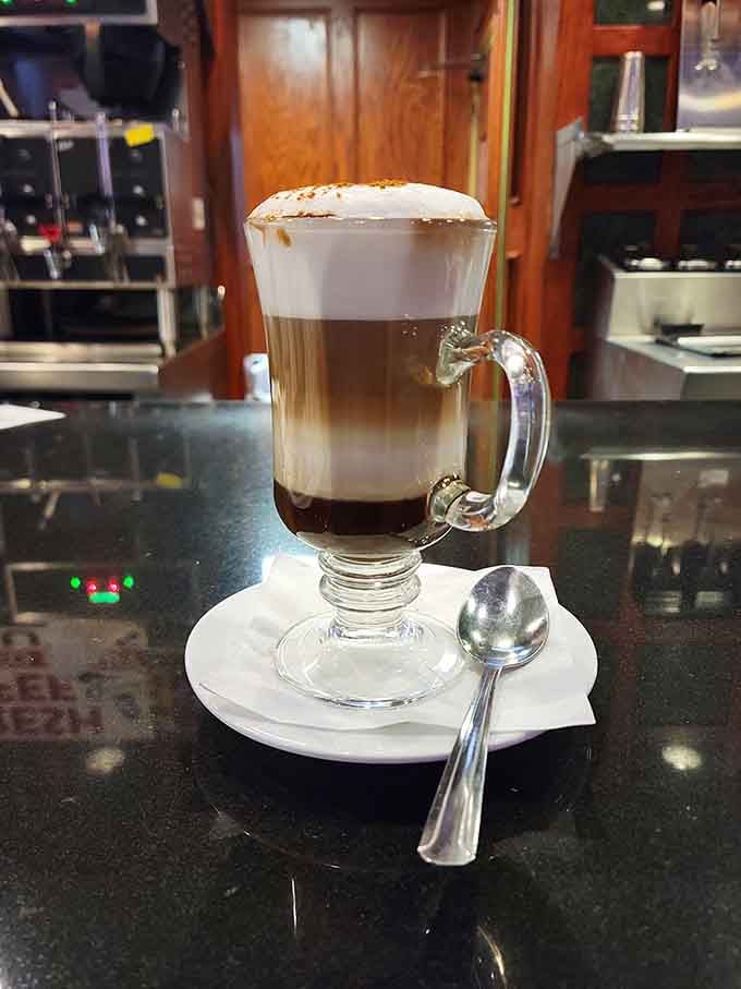 Layered like a sunset in a glass, this cappuccino is the calm before the burger storm.
