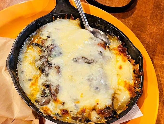 Bubbling cheese straight from a cast iron skillet — this Oaxaca fundido is molten, magnificent, and completely non-negotiable.