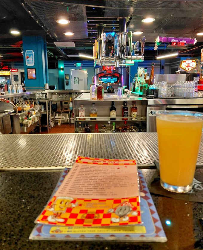 The full bar at Coin-Op is stocked, colorful, and ready to fuel whatever gaming adventure you're planning tonight.