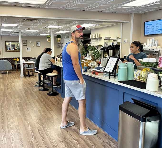 The counter where magic happens and friendly faces greet you, making ordering feel like catching up with neighbors.