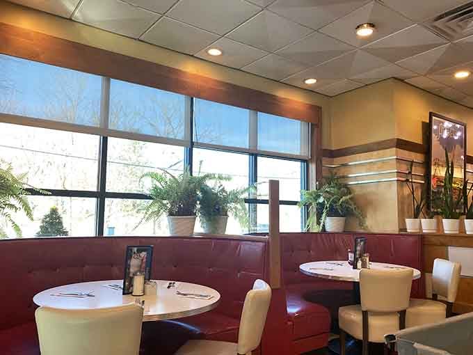 Travel posters, retro light fixtures, and a menu board listing milkshakes. This room has its priorities straight.