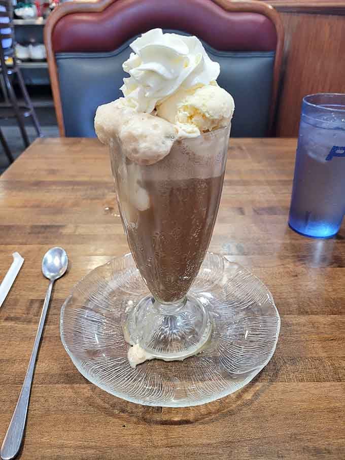 That ice cream float isn't just dessert, it's a tall, whipped-cream-crowned argument for staying a little longer.