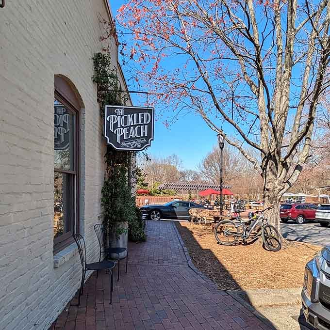 The Pickled Peach's ornate hanging sign and ivy-draped brick wall practically dare you to walk past without stopping for handcrafted goods.