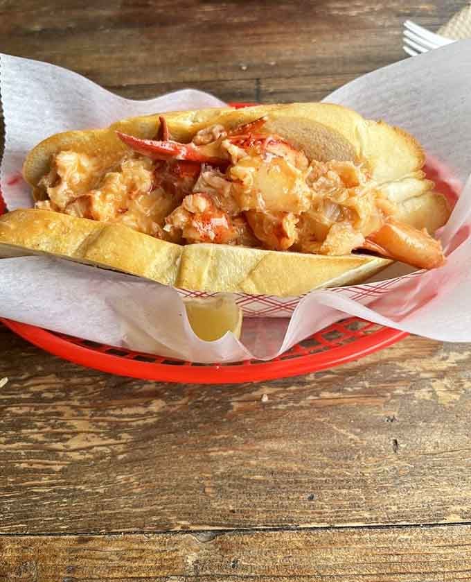 A lobster roll bursting with sweet meat that would make any Maine fisherman nod in approval and respect.