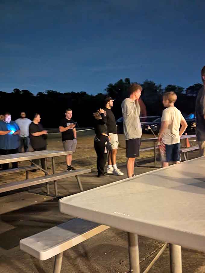 The pre-show crowd gathering near the picnic tables, nobody stressed, everybody just happy to be there together.