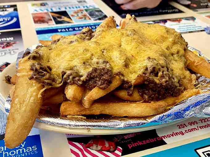 Chili cheese fries that arrive looking like a warm hug from someone who really knows what they're doing.