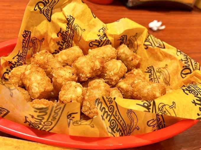 A basket of golden tater tots so perfectly crispy, they deserve their own standing ovation.