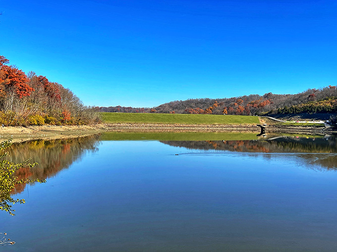 The water turned into a mirror and the autumn hillside couldn't resist taking a long, admiring look at itself.