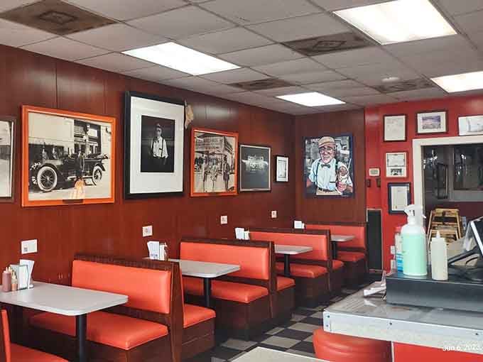 Red booths, wood-paneled walls, and photographs that tell a century of stories. History never looked this comfortable.