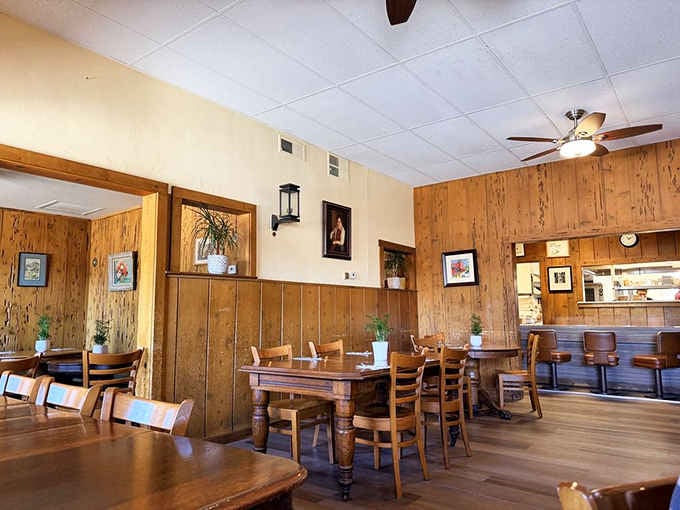 More warm wood, framed art, and an open kitchen counter. Duarte's interior hasn't chased trends, and that's the point.