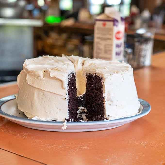 This chocolate cake with frosting stands tall and proud, ready to make every birthday wish come true.