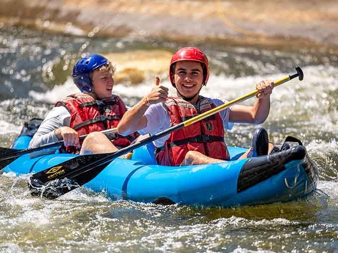 Thumbs up and paddles ready. These two have figured out that South Bend's best kept secret involves getting completely soaked.