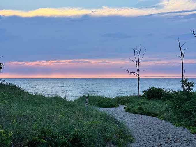 That sandy path through the dunes is short, but what's waiting on the other side is absolutely worth it.