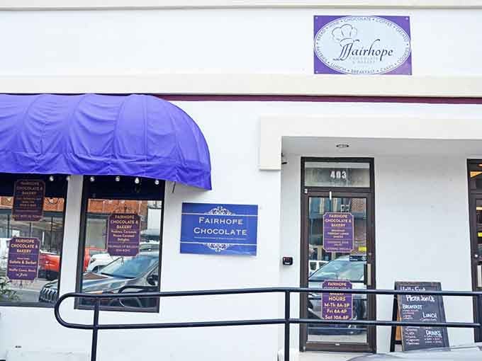 Fairhope Chocolate and Bakery's purple awning is basically a beacon for anyone who believes dessert deserves its own destination.