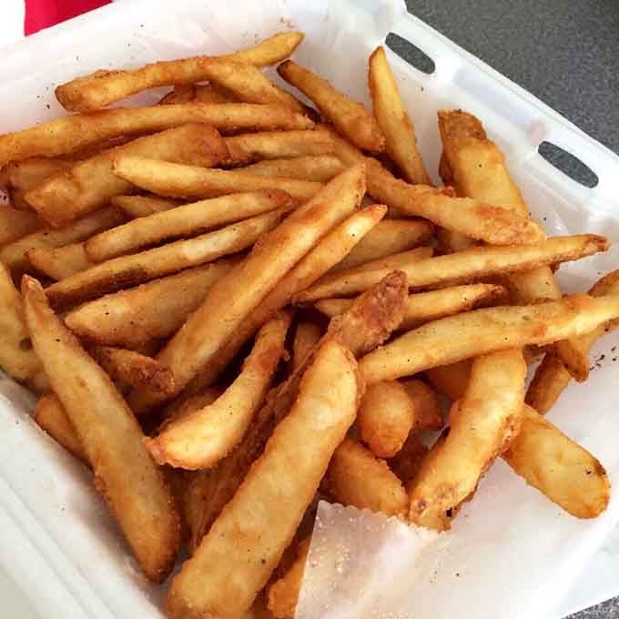 Seasoned, golden, and gloriously crispy; these fries are the unsung supporting cast in a very delicious production.