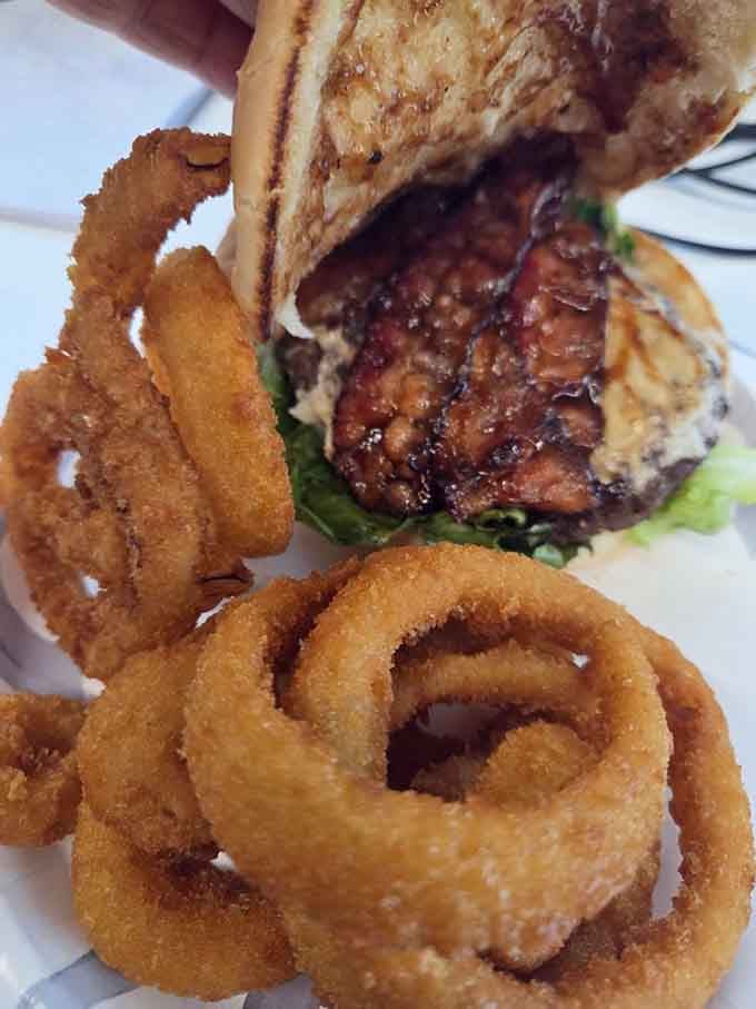 BBQ burger meets onion rings: when your meal looks like it belongs in a food magazine's greatest hits.