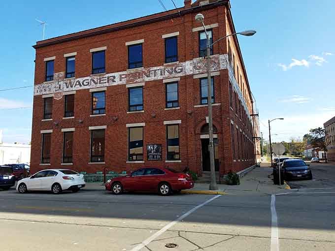 The Wagner Printing building's weathered brick tells stories of an industrial past when craftsmanship and commerce built communities together.