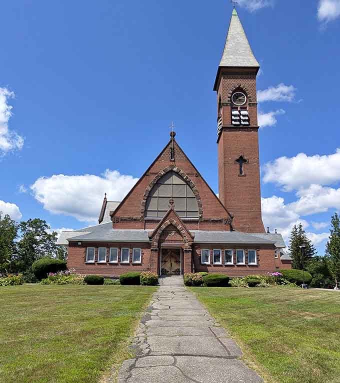 Maranatha Christian Church rises against a brilliant blue sky, its brick tower a landmark that anchors the whole neighborhood.