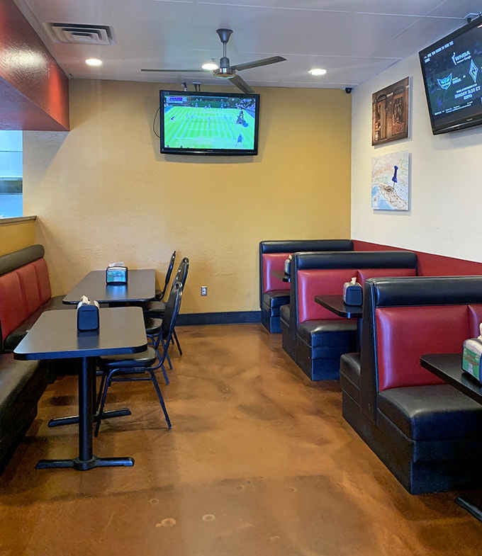 Clean booths, warm lighting, and a game on every screen. Geno's figured out the formula for a perfect afternoon.