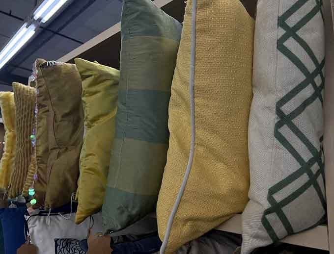 Throw pillows in yellows and greens, ready to add that perfect pop of color to any couch.